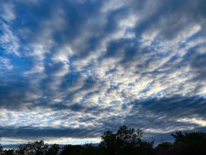 Pretty Blue and White Cloud Formations at Sunset Stock Photo - Image of ...
