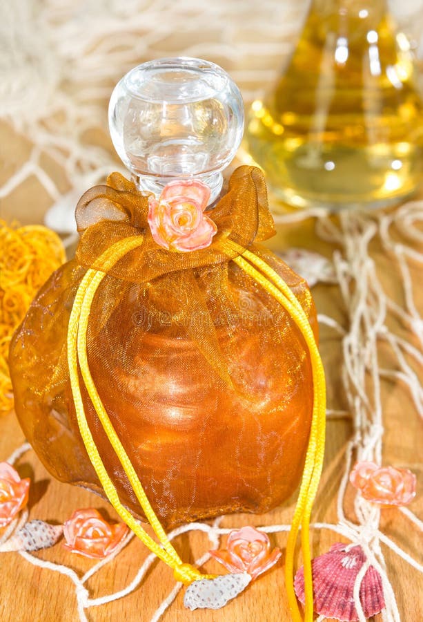 Pretty bottle of perfume stock image. Image of essence - 32329125