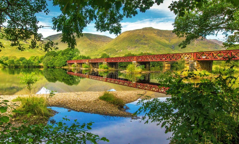 Pretty Bridge Over Scottish Loch Stock Image - Image of beautiful, peat ...