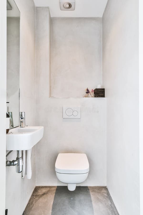 Pretty bright bathroom stock image. Image of apartment - 233249377