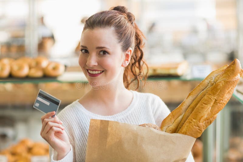 Pretty Brunette with Bag of Bread and Credit Card Stock Photo - Image ...