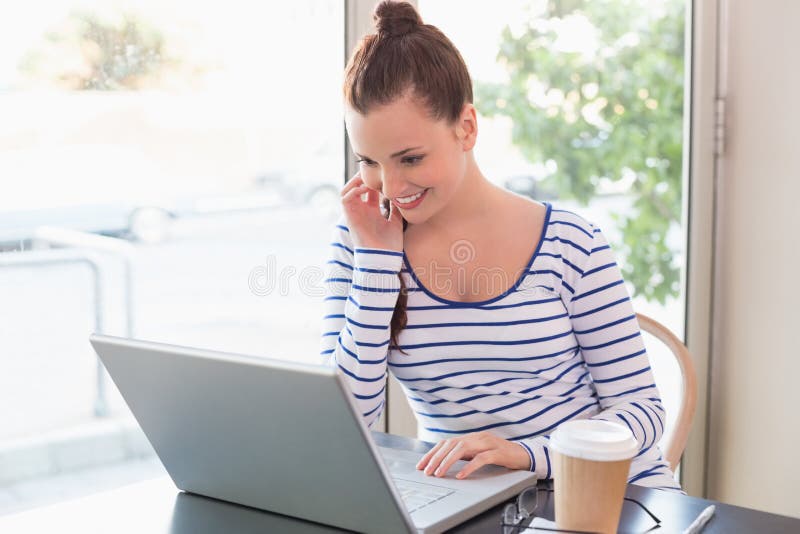 Pretty Brunette Catching Up on Work Stock Image - Image of cafeteria ...