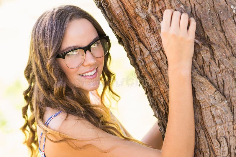 Pretty Brunette Hugging Tree Stock Photo - Image of happiness, posing ...