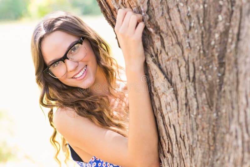 Pretty Brunette Hugging Tree Stock Image - Image of female, activities ...