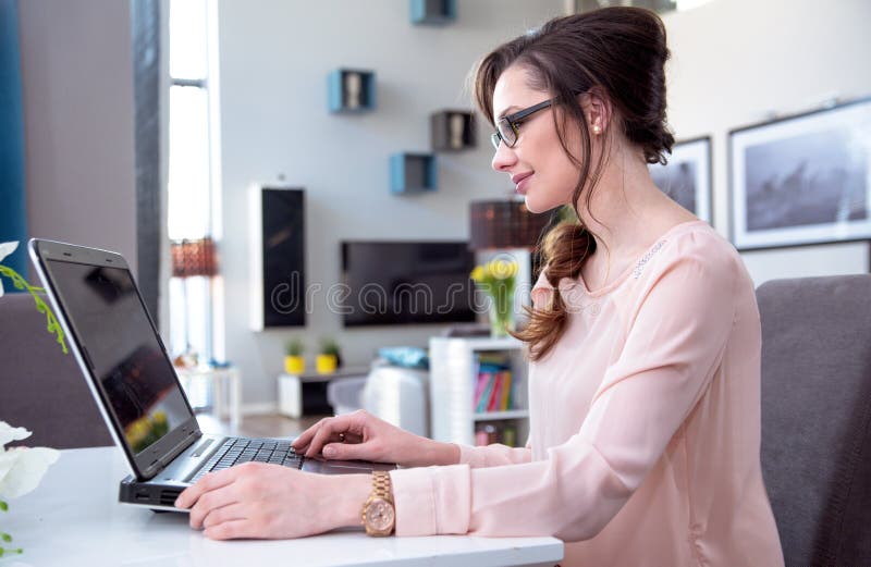 Pretty Brunette Lady Using the Laptop Stock Image - Image of home ...