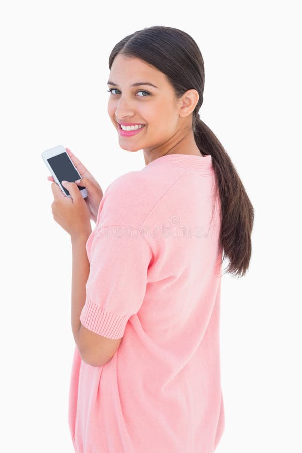 Pretty Brunette Sending a Text Message Stock Image - Image of youthful ...
