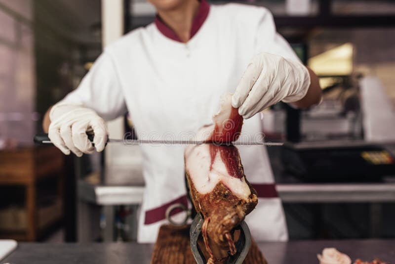 Pretty Butchery Woman Cutting Ham. Stock Image - Image of people ...