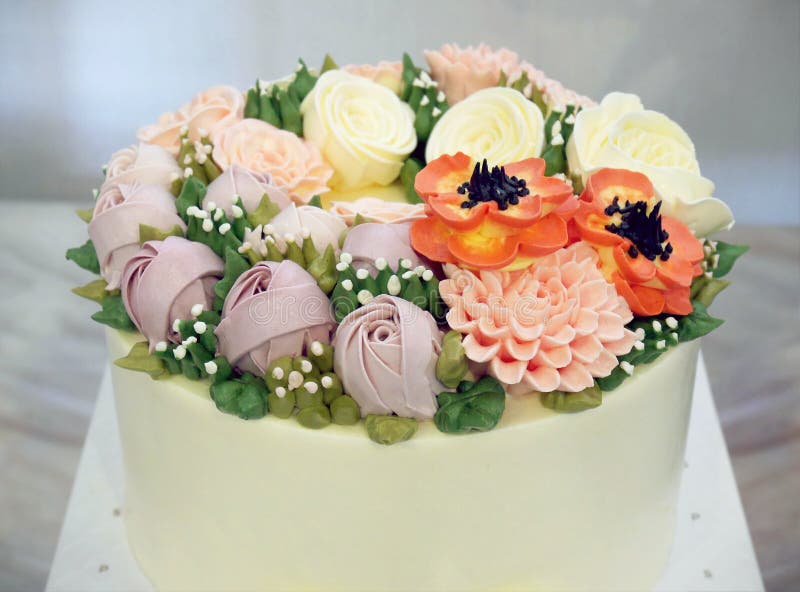 Pretty Cake Decorations with Flower Topper Stock Image - Image of cream ...