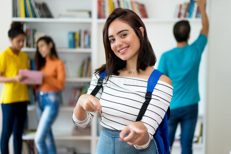 Pretty Caucasian Female Student with Group of Students Stock Photo ...