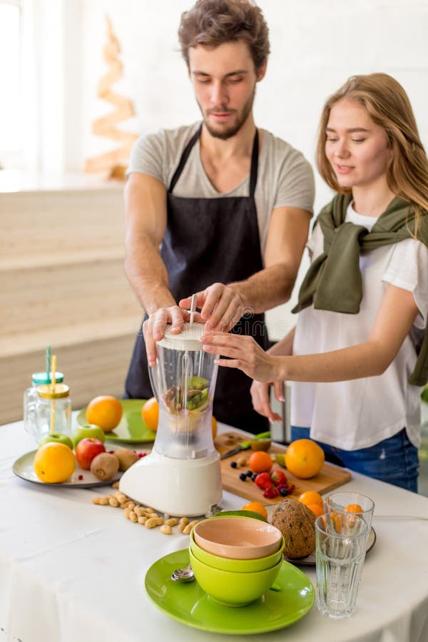 Pretty Chef and His Assistant Making a Special Blend Stock Image ...