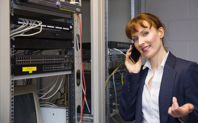 Pretty Computer Technician Talking on Phone beside Open Server Stock ...