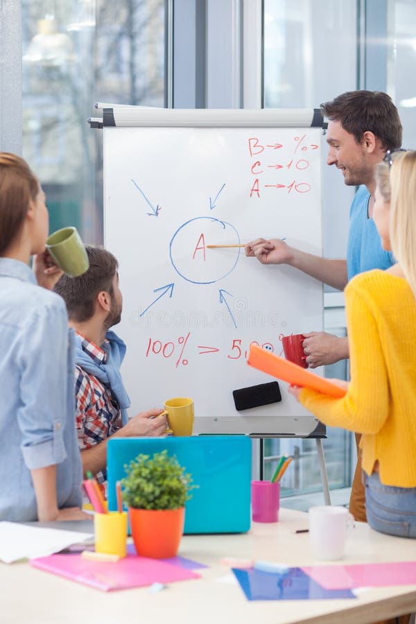 Pretty Creative Team is Working Together with Joy Stock Photo - Image ...