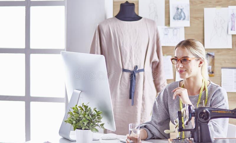 Pretty Dressmaker Showing a New Design To Her Client Stock Image ...