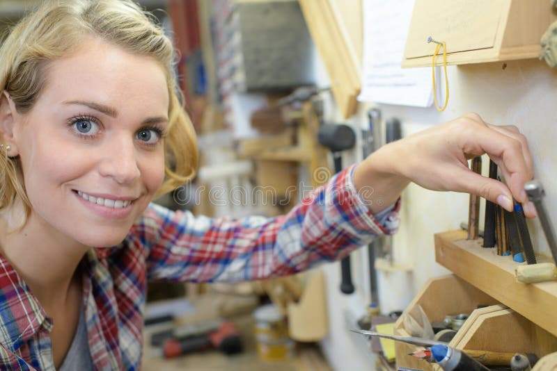 Pretty Female Carpenter at Work in Workplace Stock Image - Image of ...