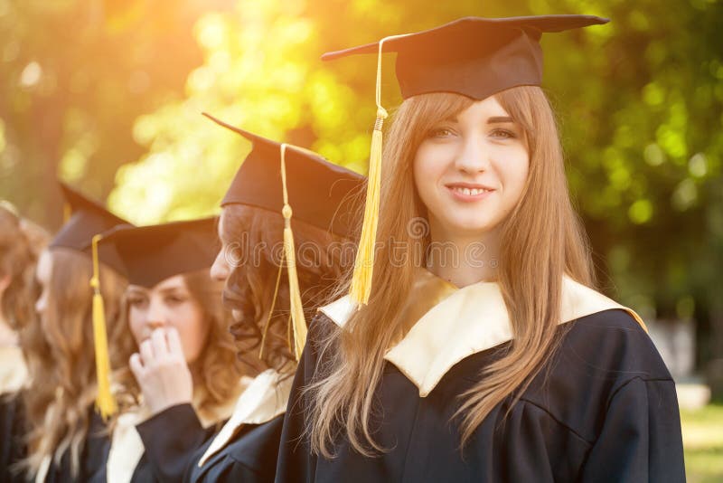 Pretty Female College Graduate at Graduation Stock Photo - Image of ...