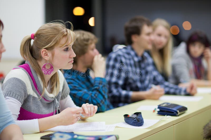 Pretty Female College Student in a Classroom Stock Image - Image of ...