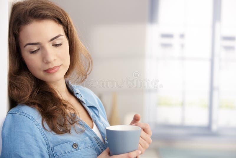 Pretty Female Daydreaming Drinking Tea Stock Image - Image of dreamy ...