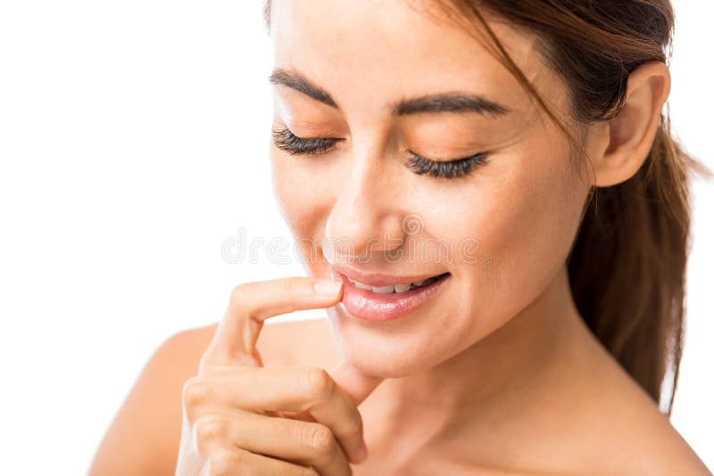 Smiling Woman Using Lip Cream Stock Image - Image of face, fresh: 130768283