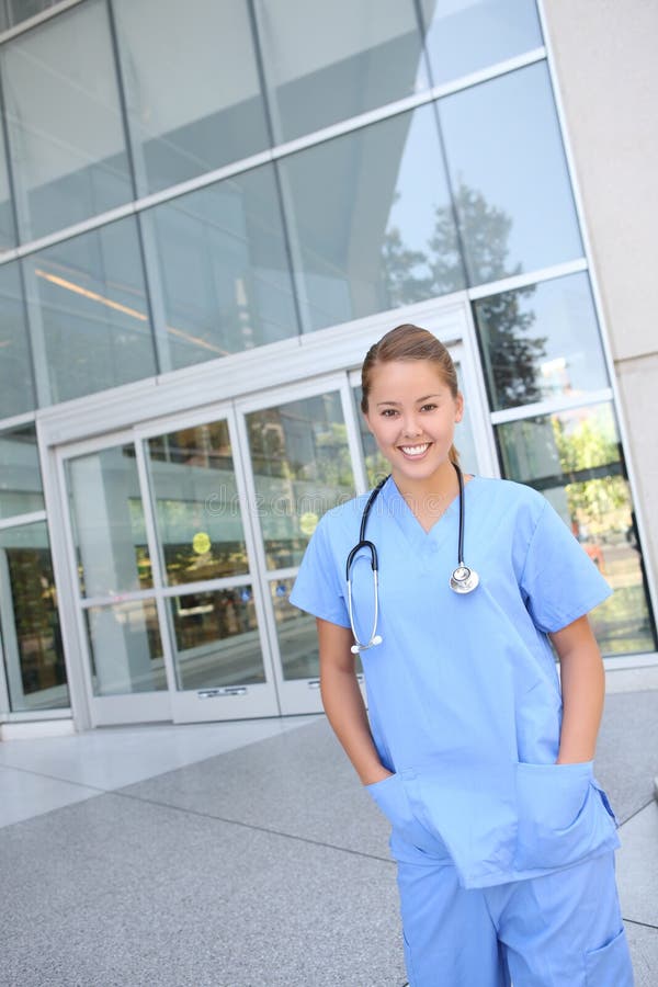 Pretty Female Nurse at Hospital Stock Photo - Image of attractive ...