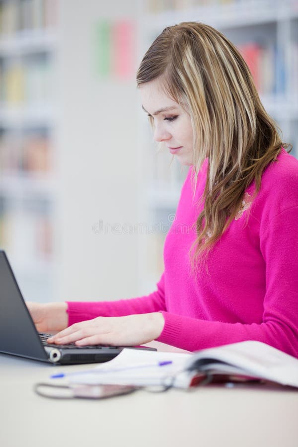 Pretty, Female Student with Laptop and Books Stock Photo - Image of ...