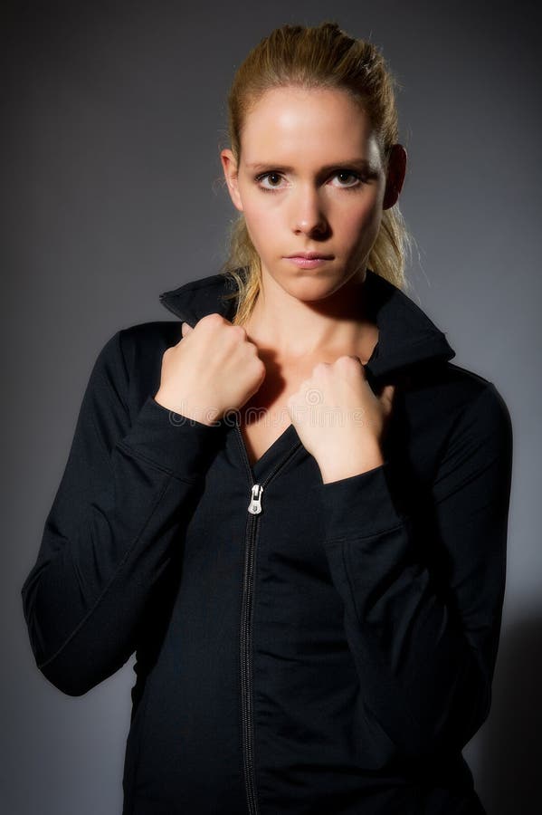 Pretty Female in Trach Suit Stock Photo - Image of fashionable, pose ...