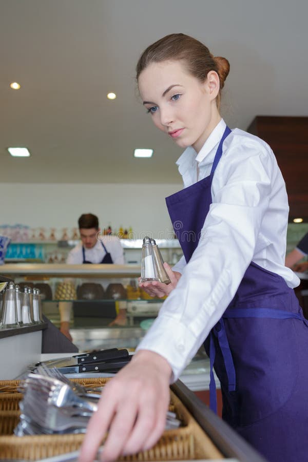 Pretty Female Waitress in Restaurant Stock Image - Image of hours ...