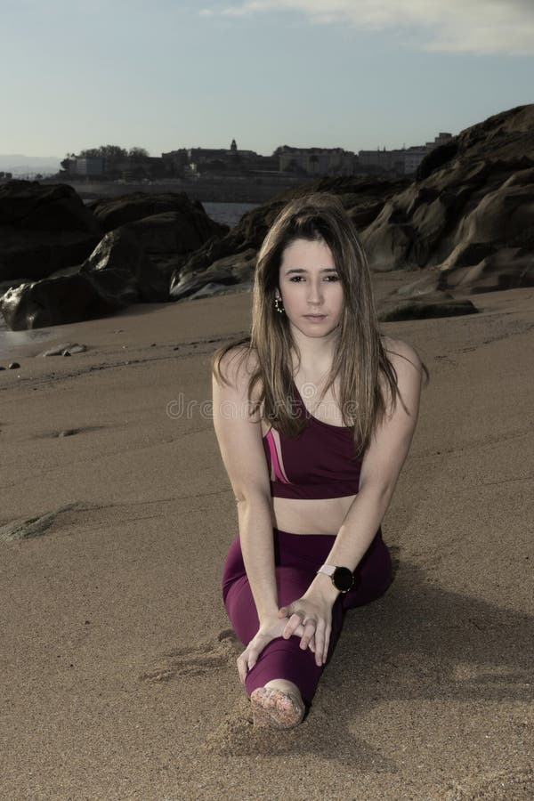 Elegant Strength: a Young Woman Showcasing Taekwondo Mastery with a ...