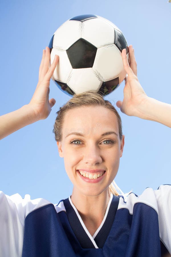 Pretty Football Player Smiling at Camera Stock Photo - Image of athlete ...