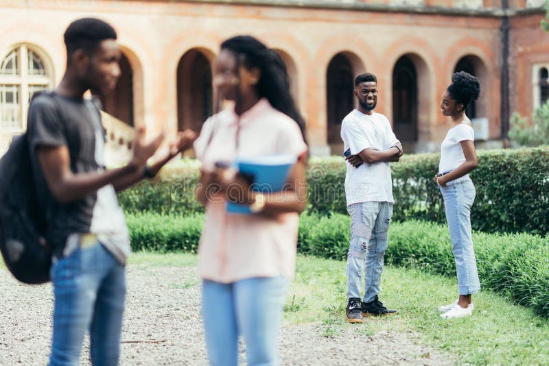 Pretty African Student Studying Outside on Campus at the University ...