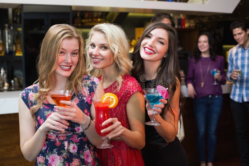Pretty Friends Drinking a Cocktail Stock Image - Image of attractive ...