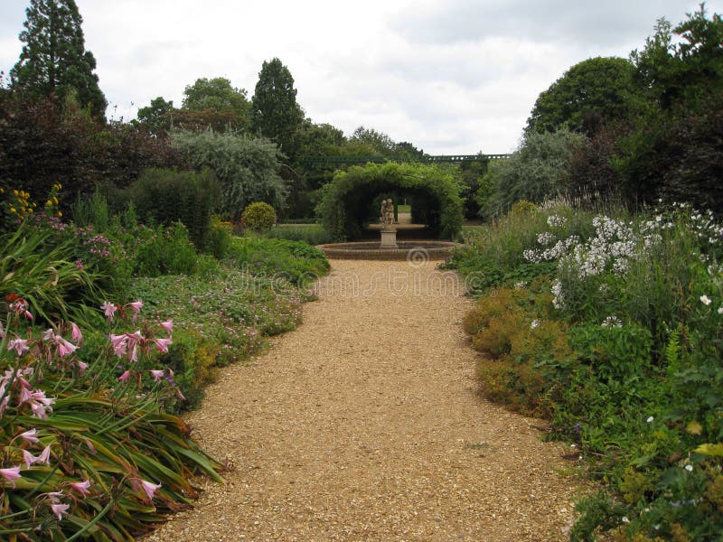 Pretty garden path stock image. Image of garden, flower - 44440159