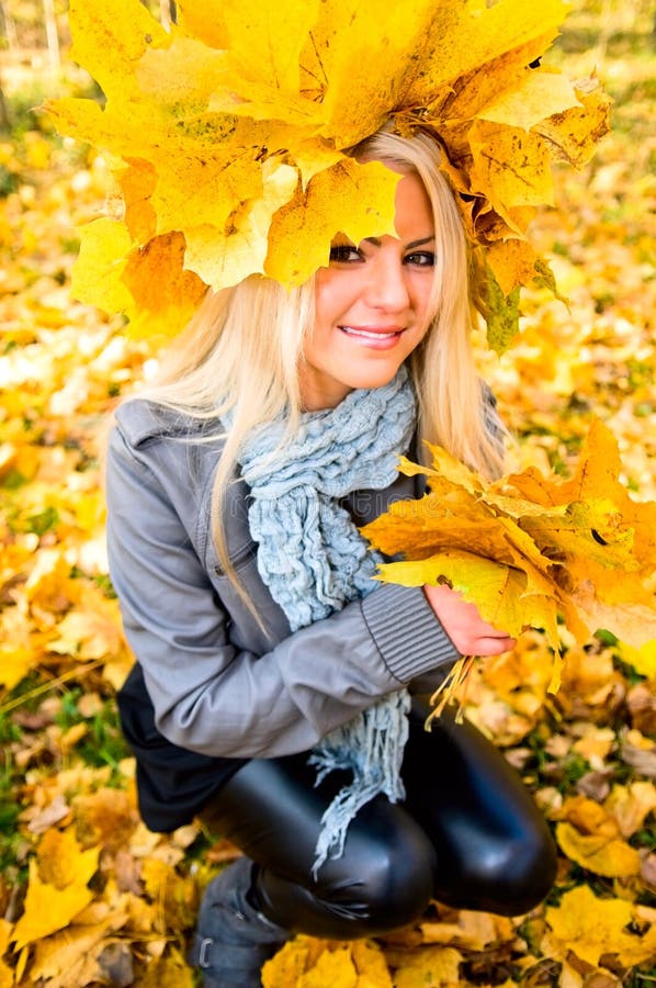 Pretty girl in autumn park stock image. Image of smiling - 15807075