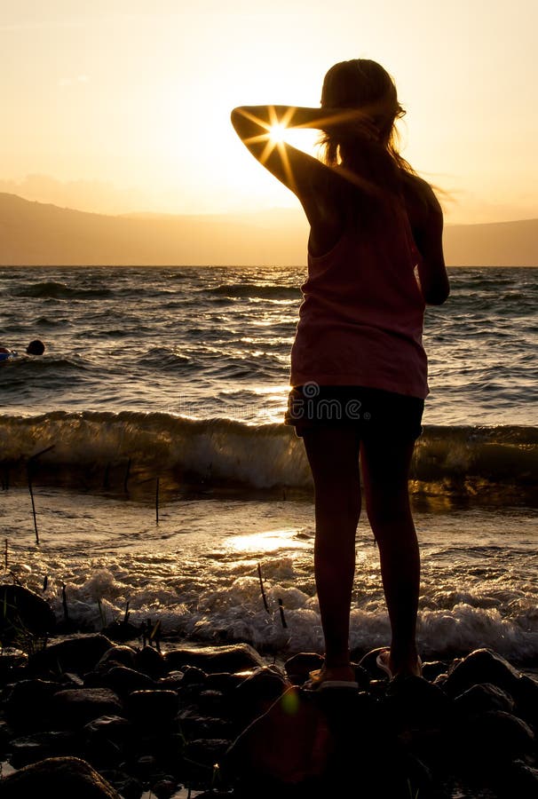 A Pretty Girl at the Beach at Sunset Evening Stock Image - Image of ...
