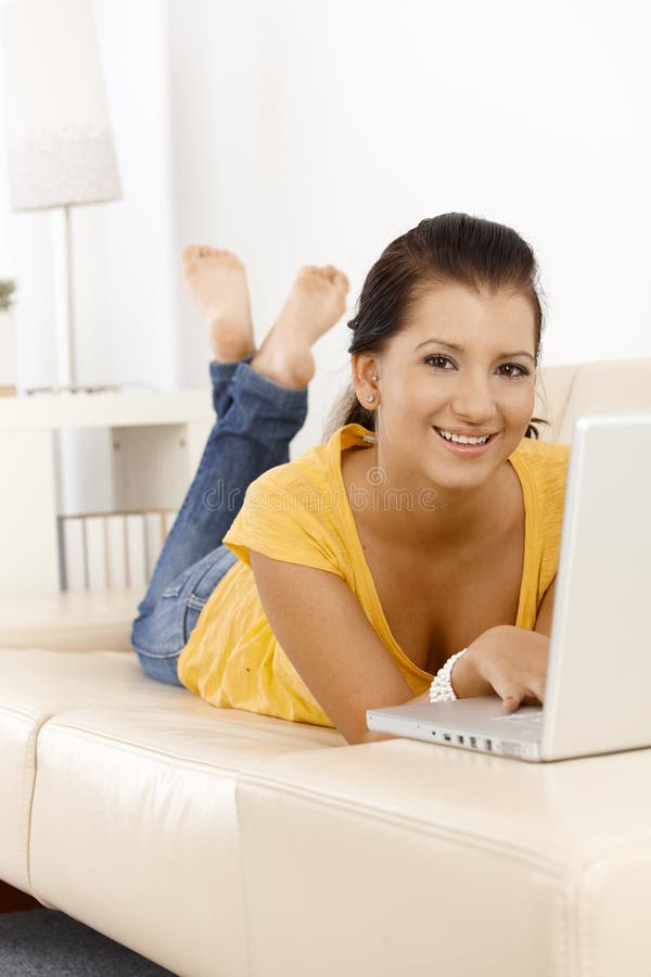 Pretty Girl with Computer Smiling Stock Image - Image of domestic ...