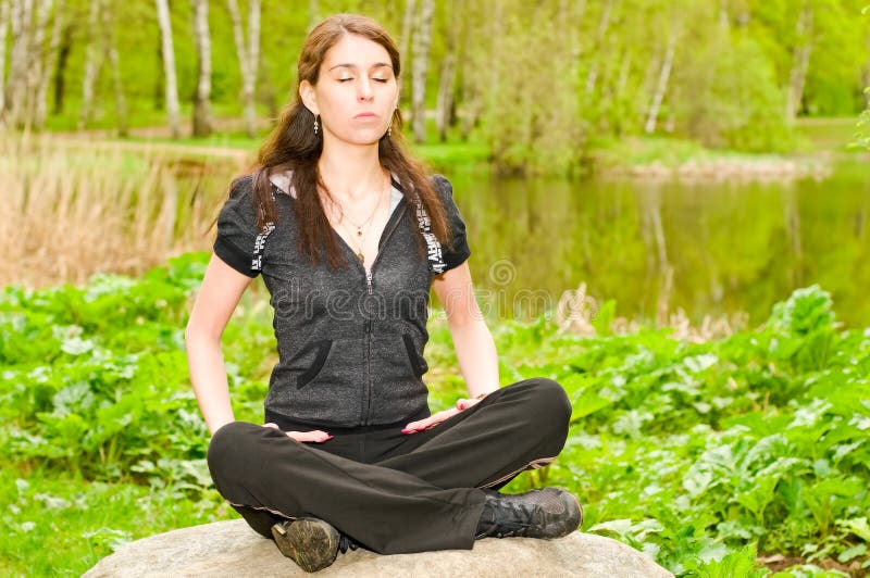 Pretty girl doing yoga stock photo. Image of nature, outdoors - 14954972