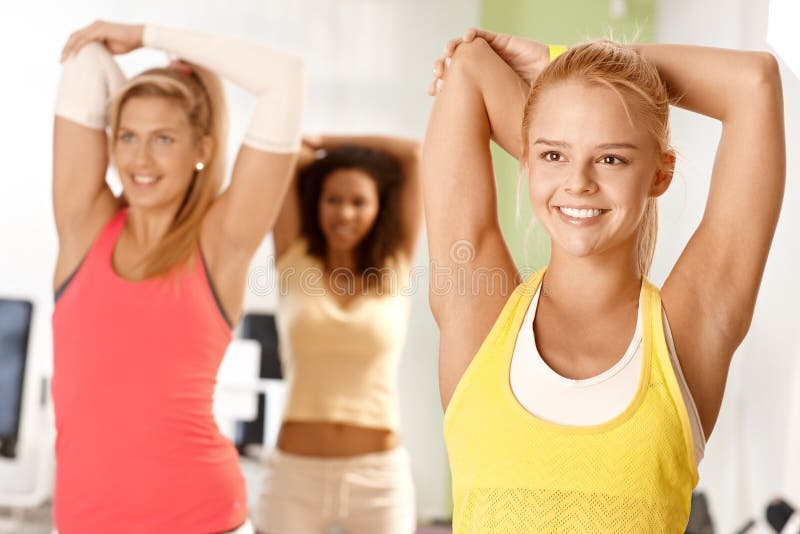 Pretty Girl Exercising in Group Stock Image - Image of activity ...