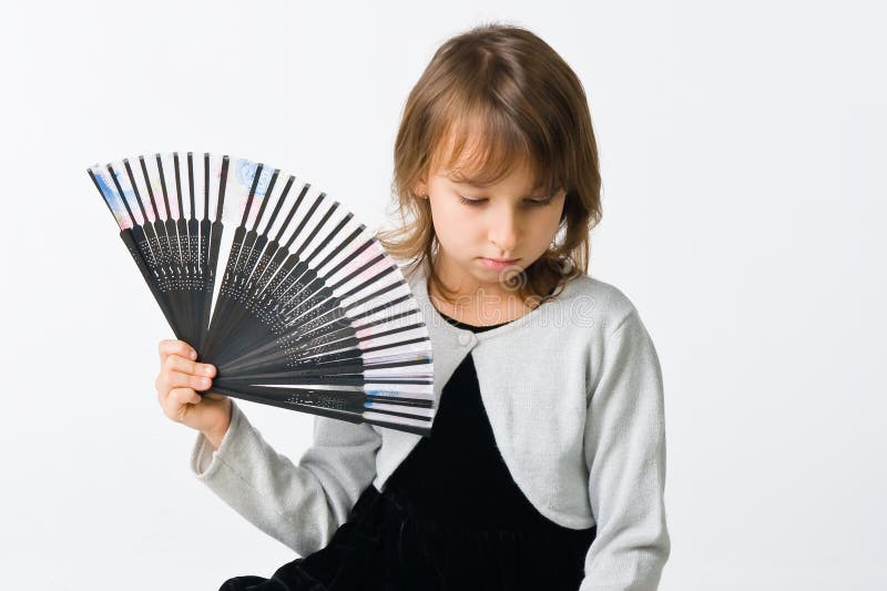 Pretty girl with fan stock photo. Image of long, dress - 14687976