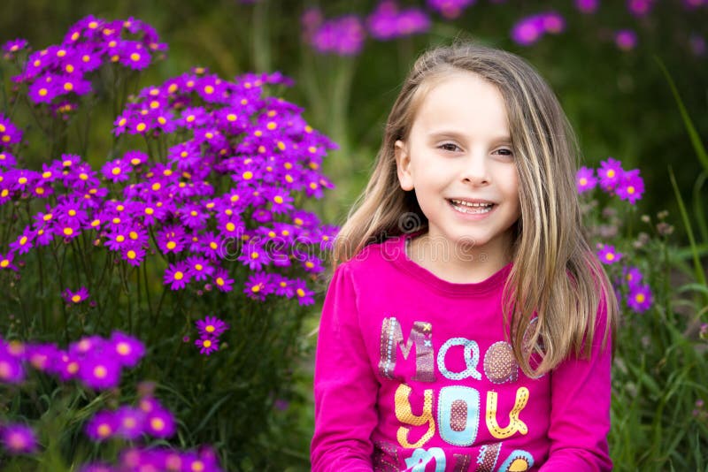 Pretty Girl with Flowers stock image. Image of small - 61385865