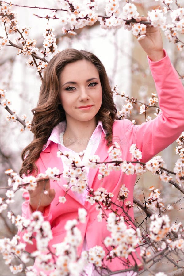 Very Beautiful Girl in Blossoming Trees in Spring Garden. Spring. Stock ...