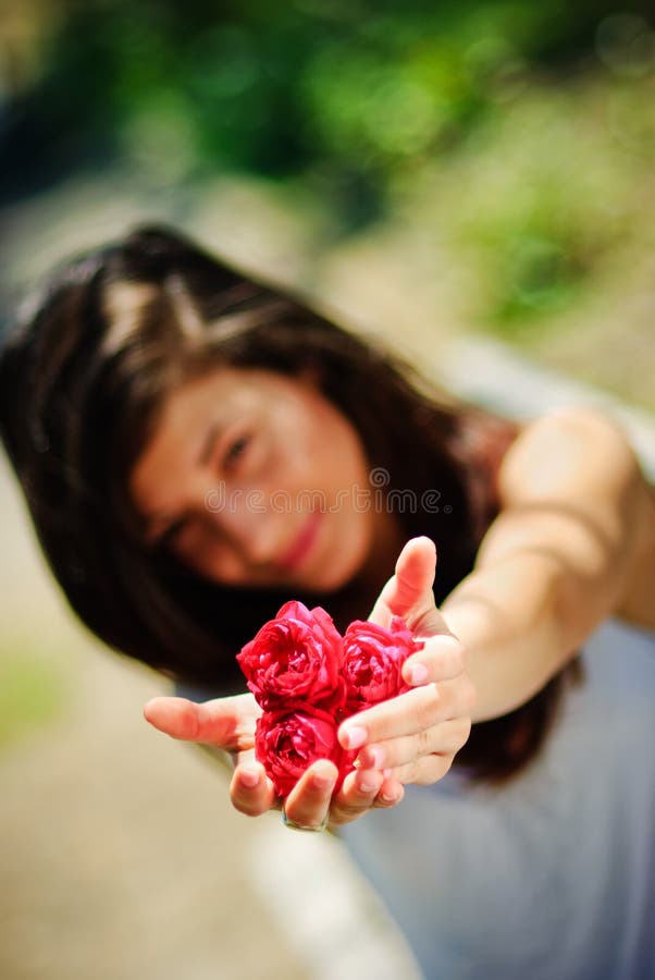 Pretty Girl Hands a Bunch of Red Roses Stock Photo - Image of relax ...