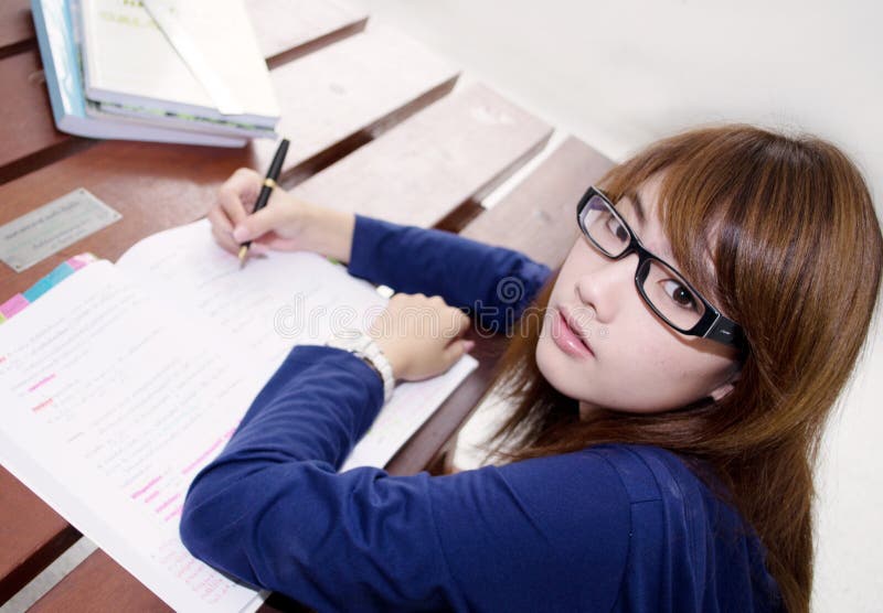 Pretty girl and homework stock photo. Image of student - 26222350