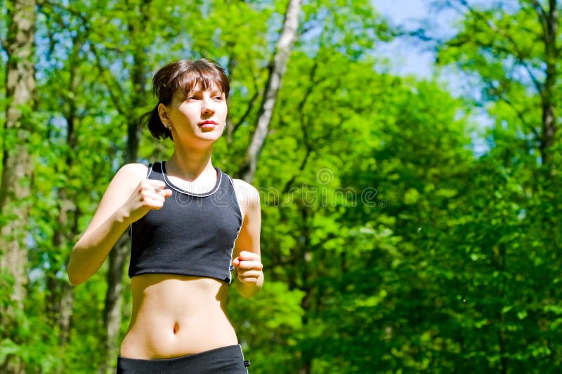 Pretty Girl Jogging and Listening Music Stock Image - Image of running ...
