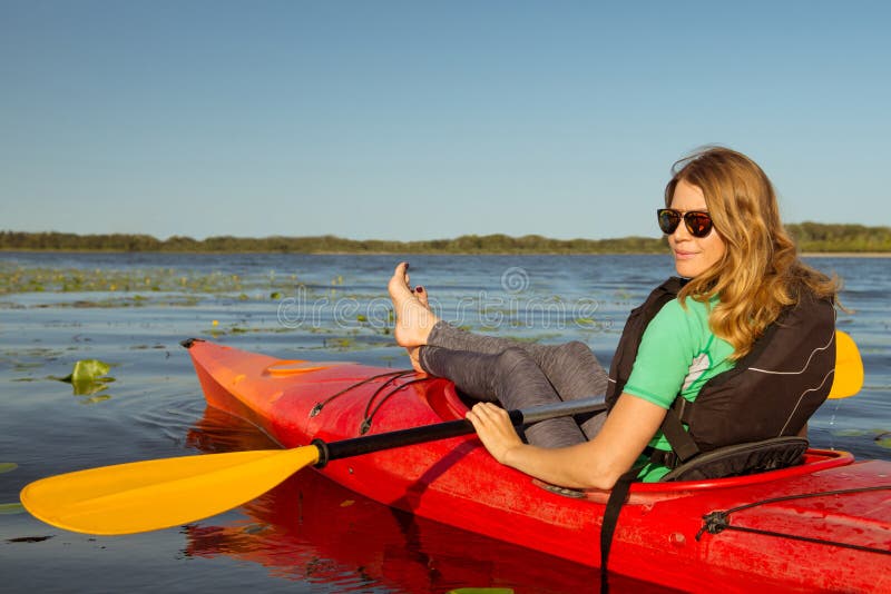 Pretty Girl in a Kayak on a River Stock Image - Image of paddle, blonde ...