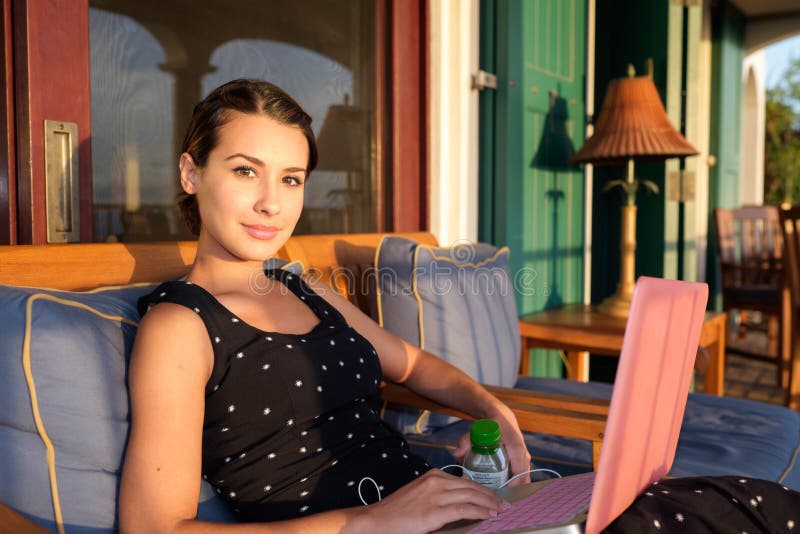 Pretty girl with laptop stock image. Image of brunette - 43158003