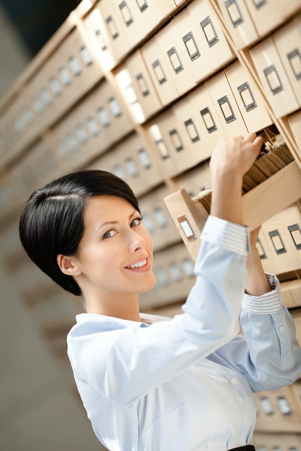 Pretty Girl Looks for Something in Card Catalog Stock Image - Image of ...