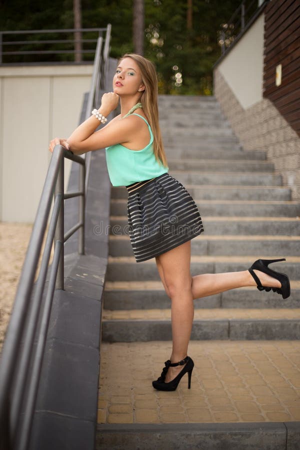 Pretty girl in park stock image. Image of pretty, trousers - 56401819