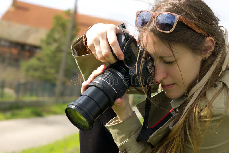 A pretty girl photographer stock photo. Image of lady - 32056702