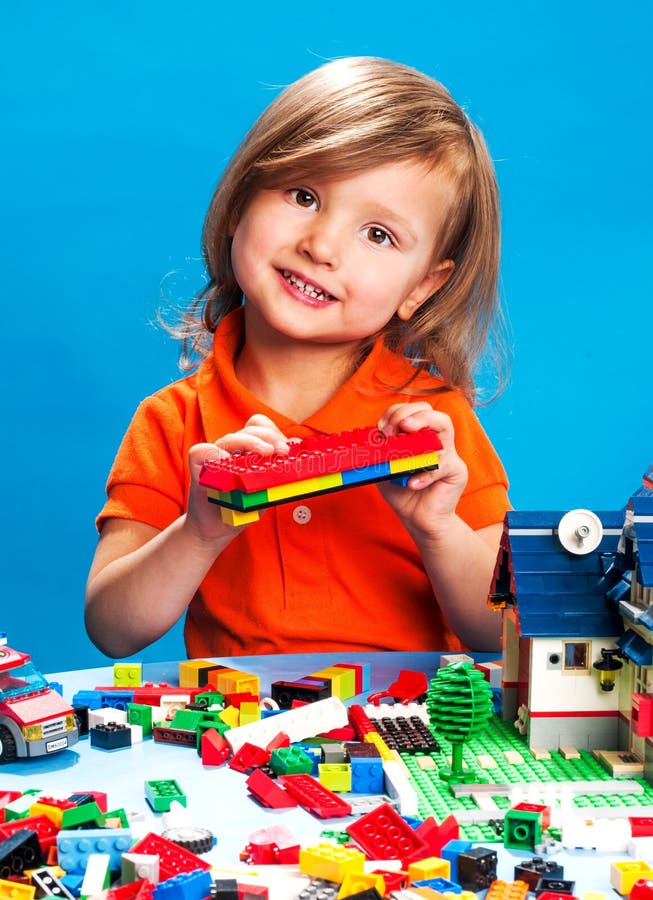 Pretty Girl Playing with Construction Blocks Stock Photo - Image of ...