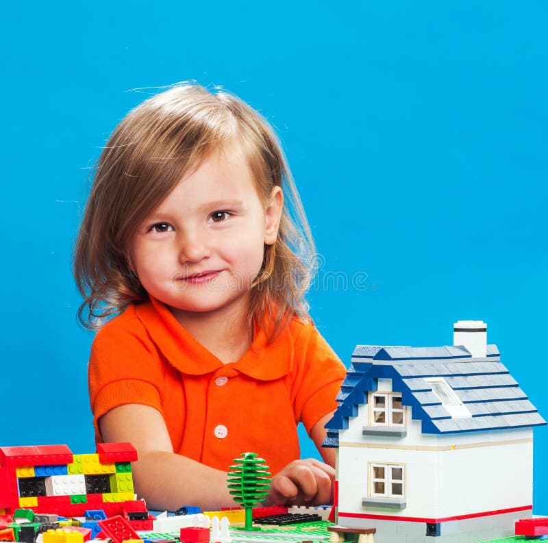Pretty Girl Playing with Construction Blocks Stock Photo - Image of ...