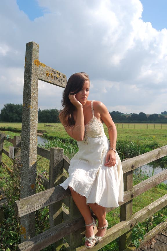 Pretty Girl by Public Footpath Stock Image - Image of country, sitting ...